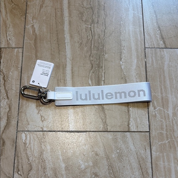 lululemon athletica | Accessories | Lululemon Never Lost Keychain Price ...